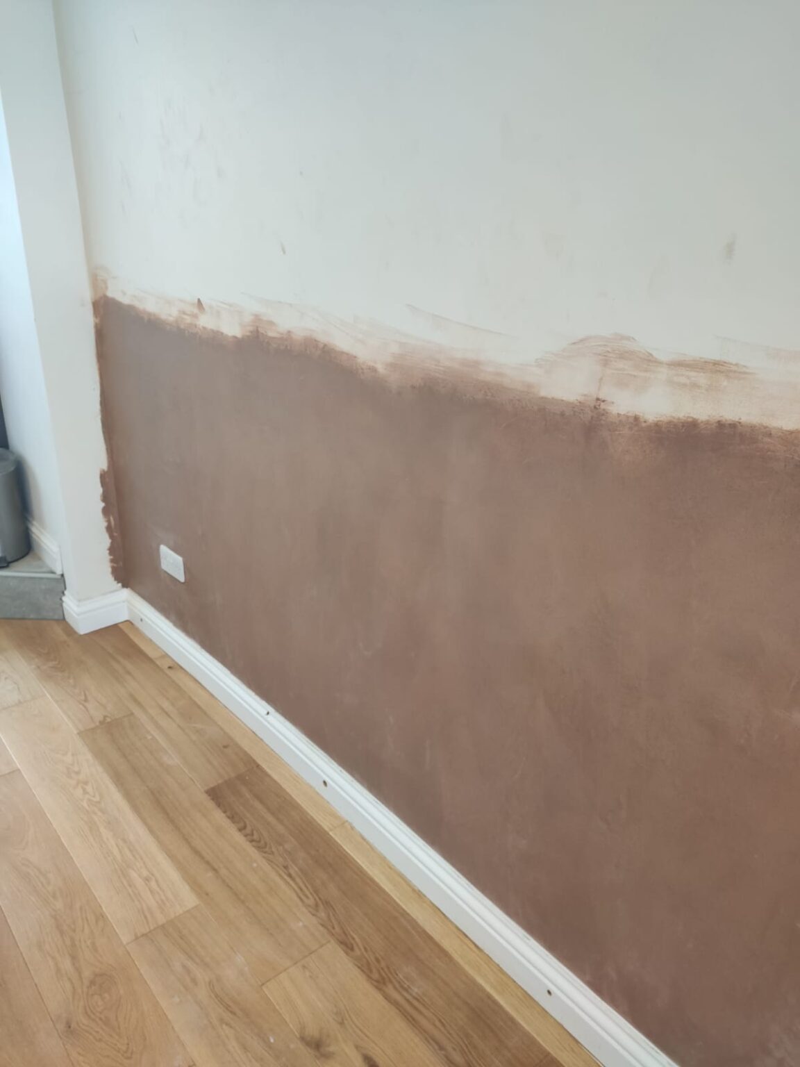 Raised ground levels over damp proof course cause damp